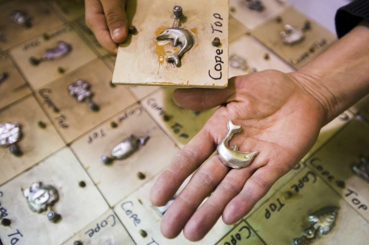 Northeast students create tokens out of molten tin during after-school ...