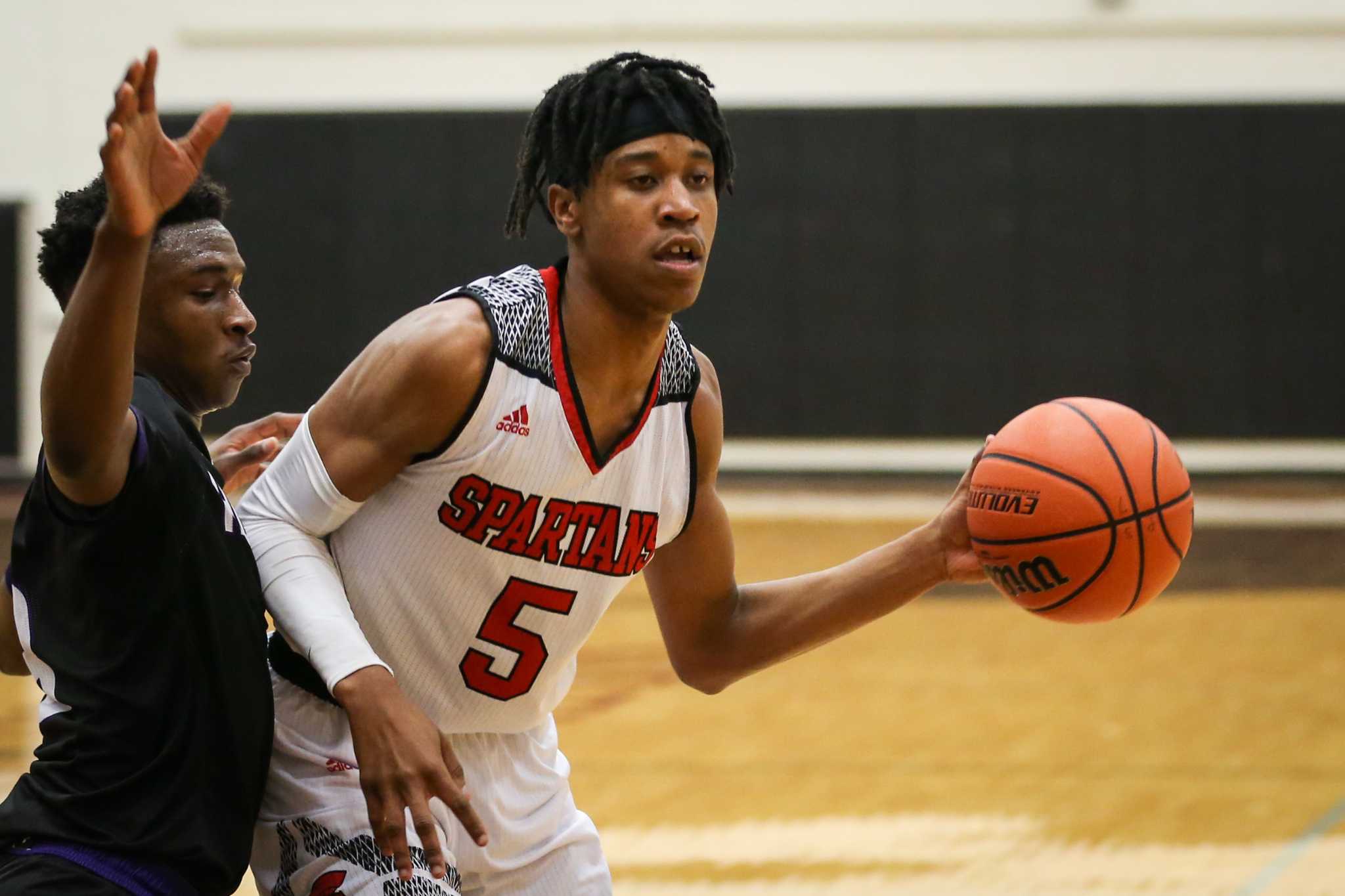 HOOPS ROUNDUP: Porter takes down rival New Caney, clinches playoff berth