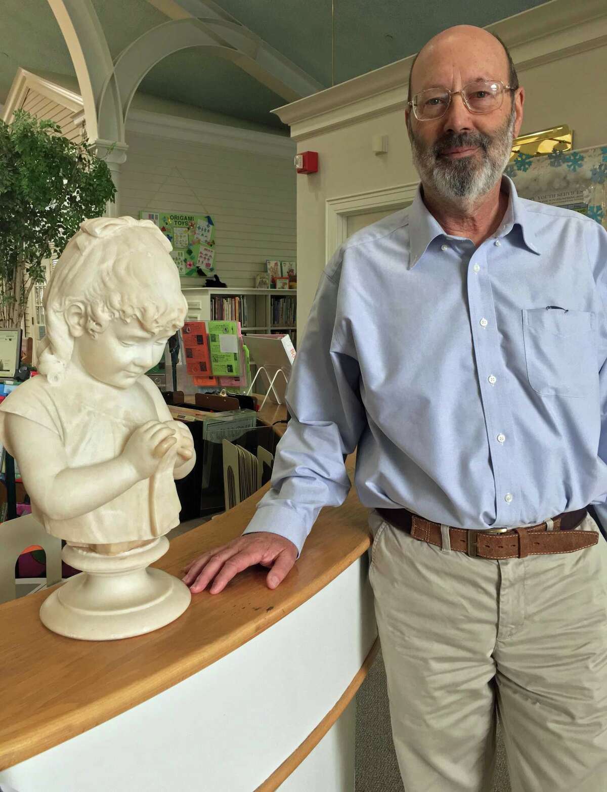 Greenwich artist finds satisfaction in art restoration