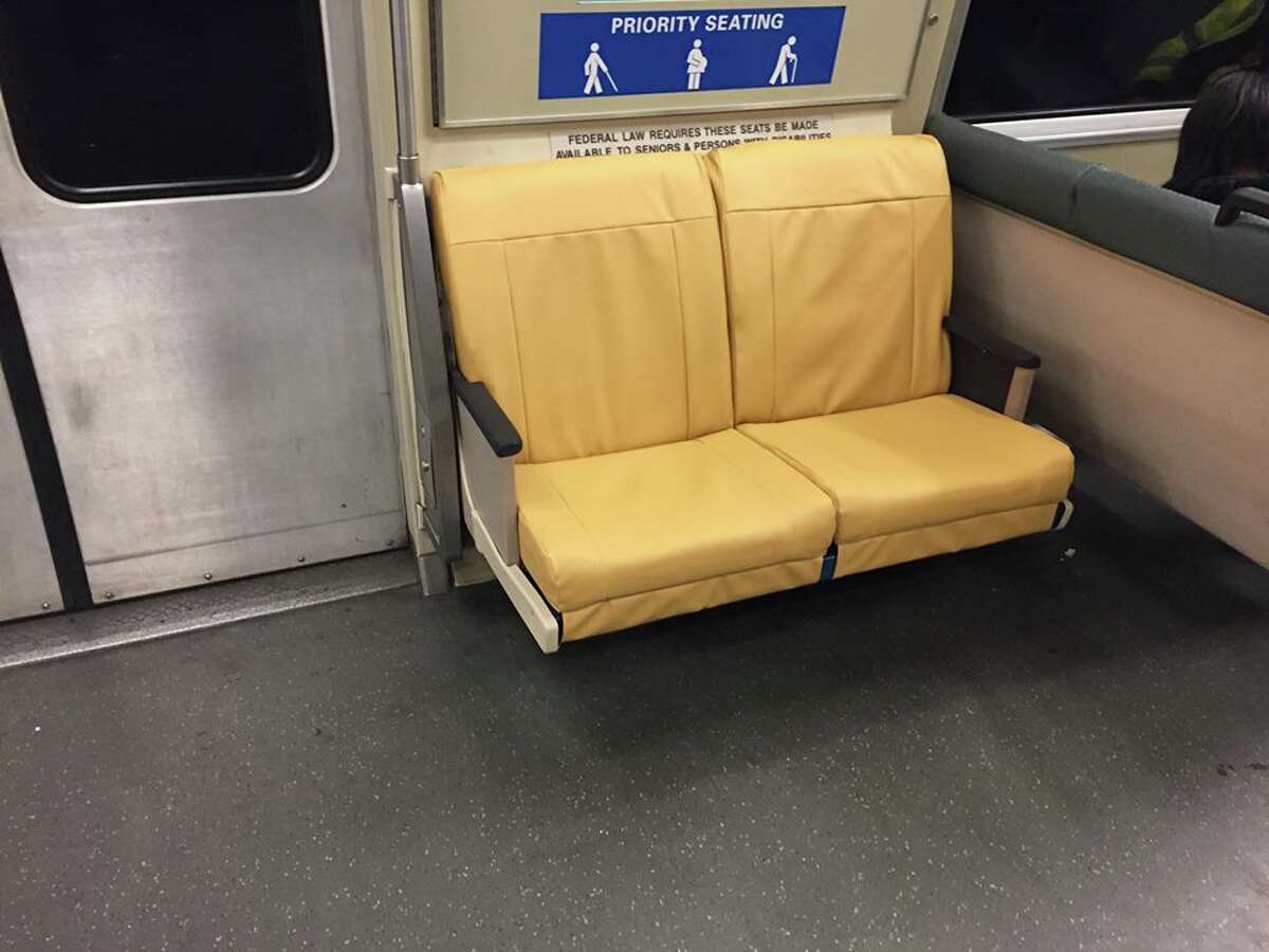 This is why BART is putting yellow seats in trains