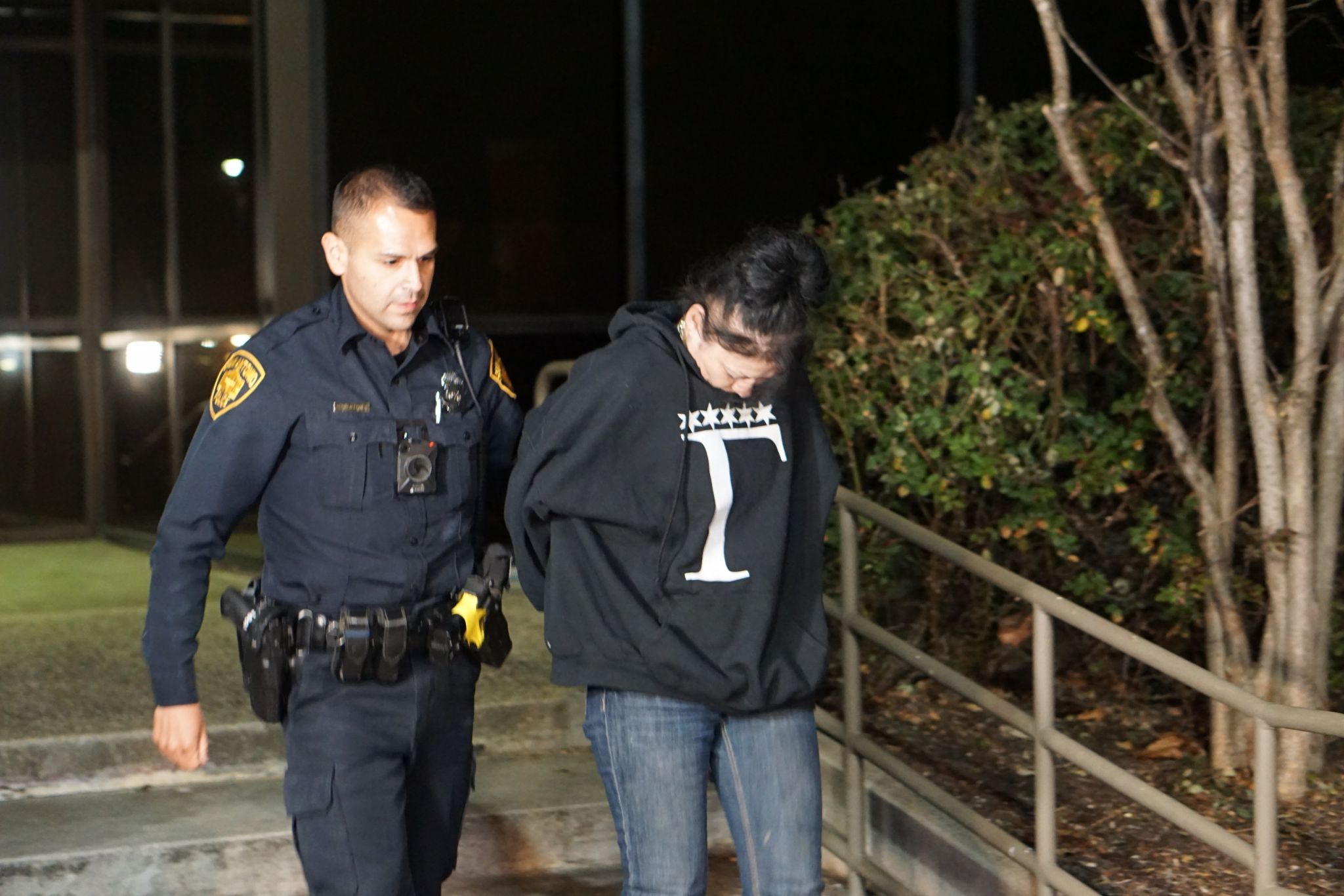 Woman accused of robbing business, person