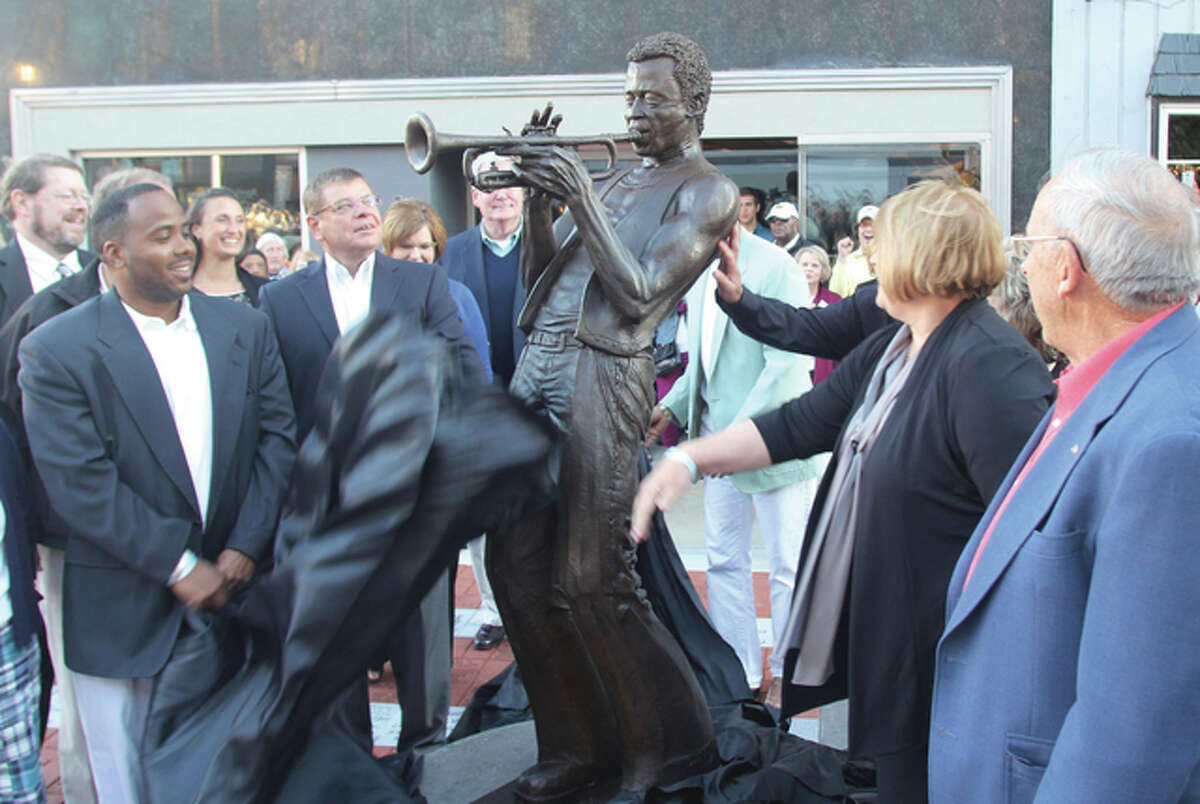 Throngs of fans, admirers turn out for Davis sculpture dedication
