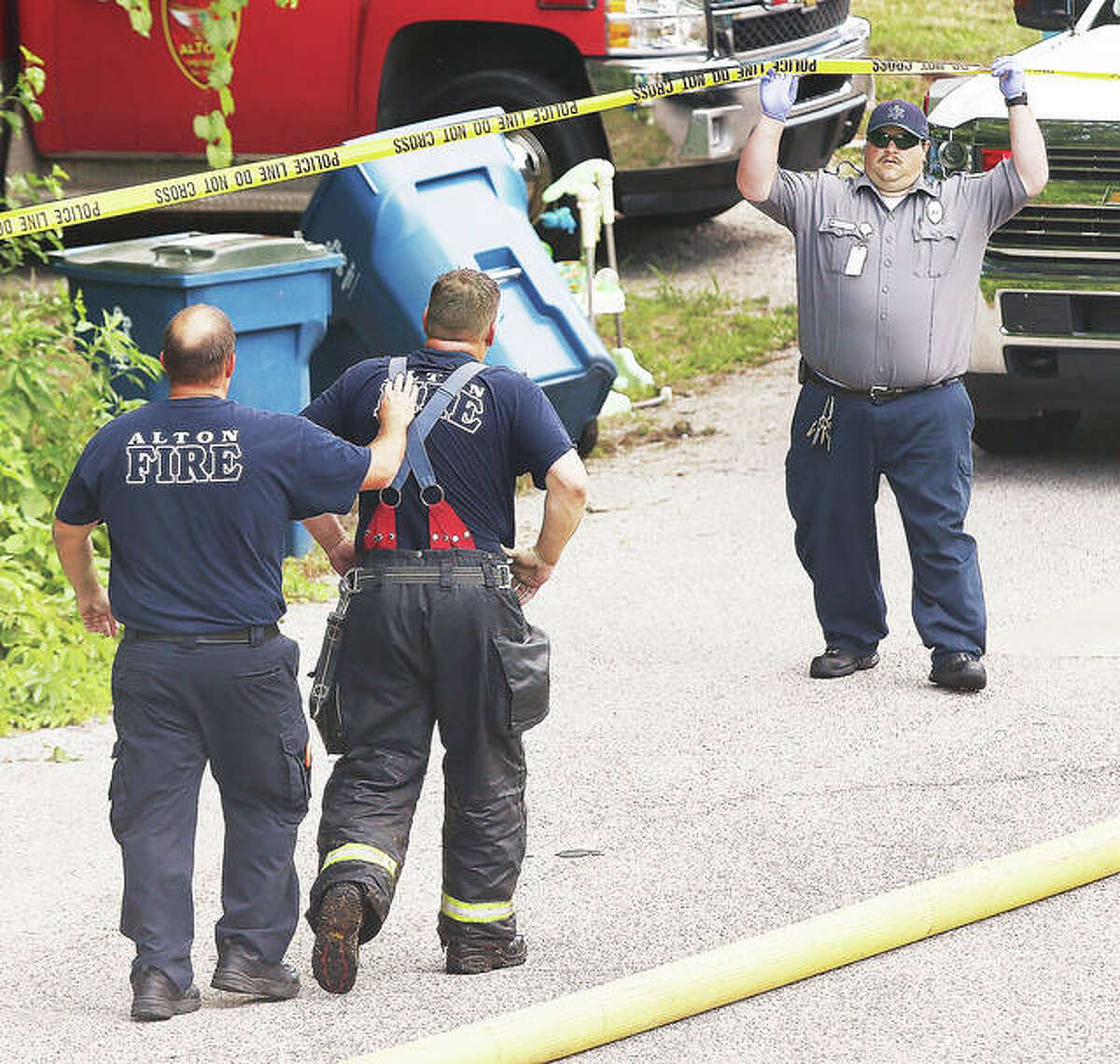 Alton firefighters rescue girl, 13, from basement of burning home