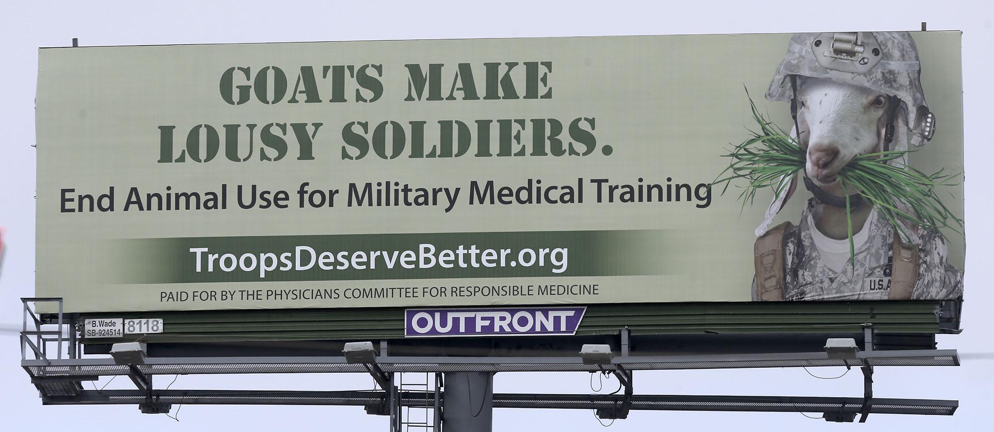 Billboards attack use of goats in Army medic training
