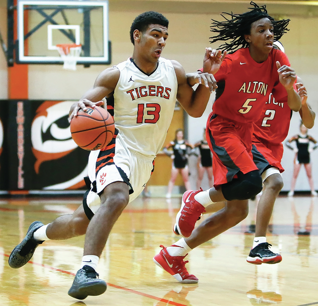 PREP BOYS BASKETBALL: Redbirds focus on big picture after loss to Tigers