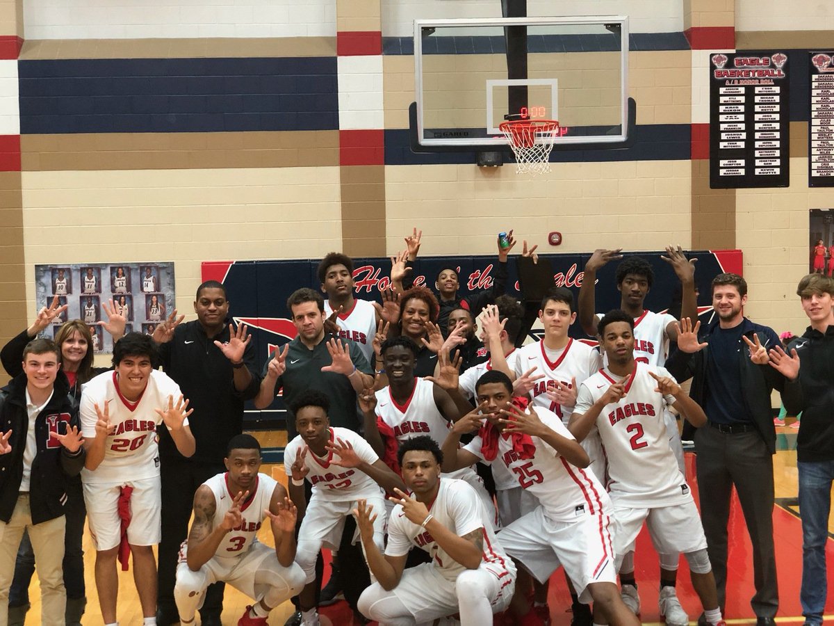 Boys' basketball: Dawson wins 7th straight district title