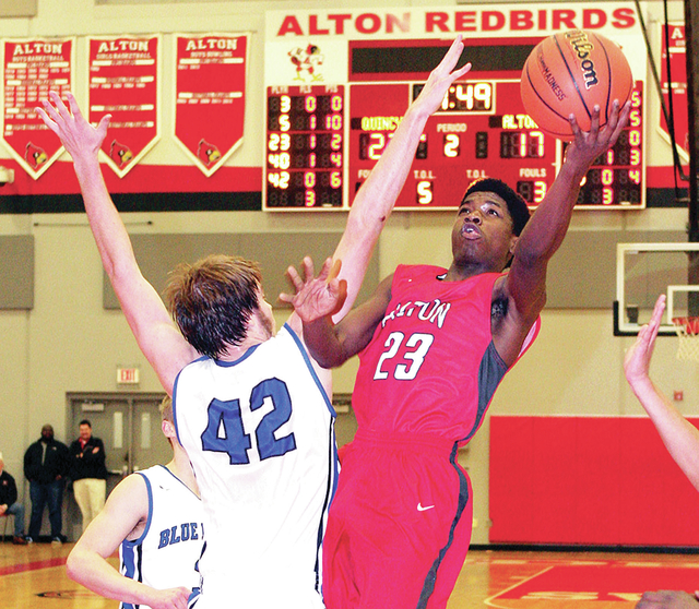 PREP BOYS BASKETBALL: Alton rallies past Quincy for regional title