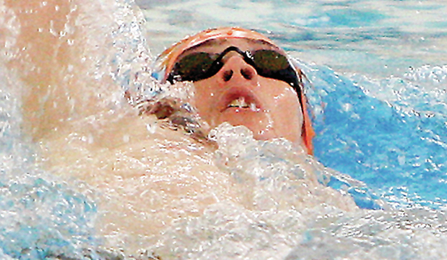 Former Breakers standout Sean Workman wins 200 backstroke heat at ...