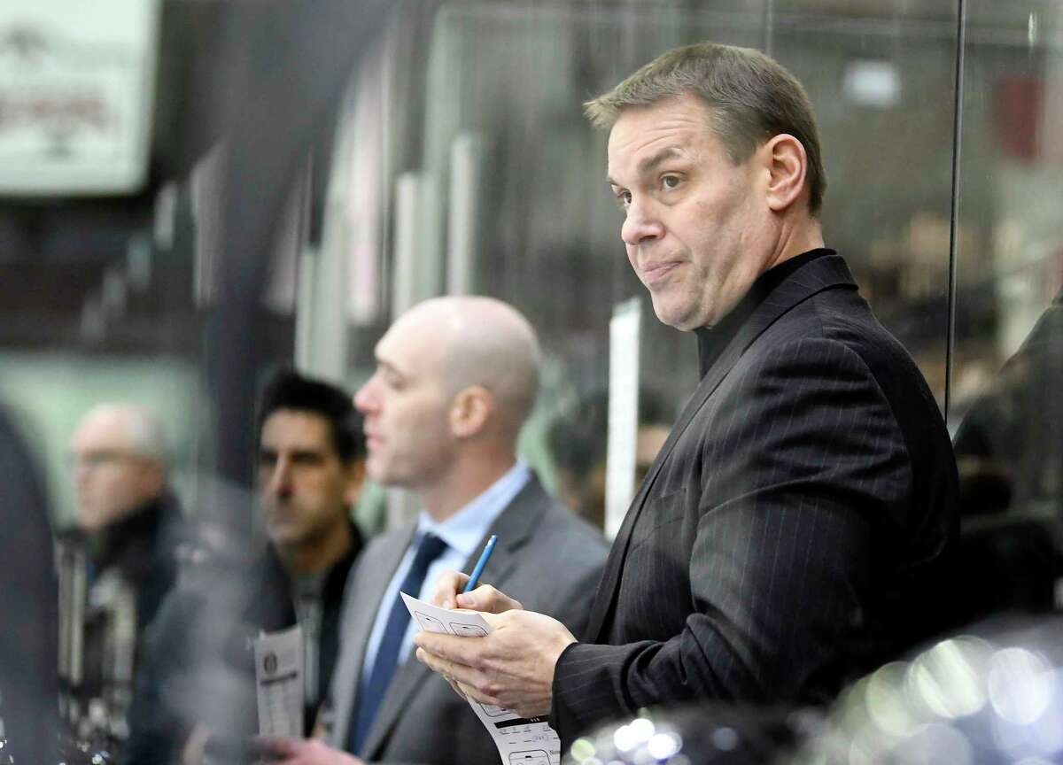 Union hockey's Rick Bennett cheers on UAlbany lacrosse's Scott Marr