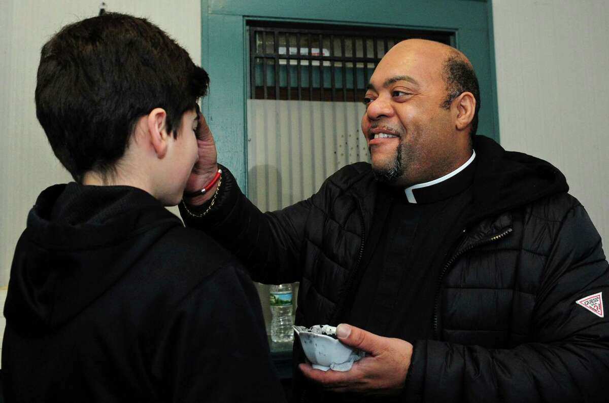 Local ministers bring ashes to the masses