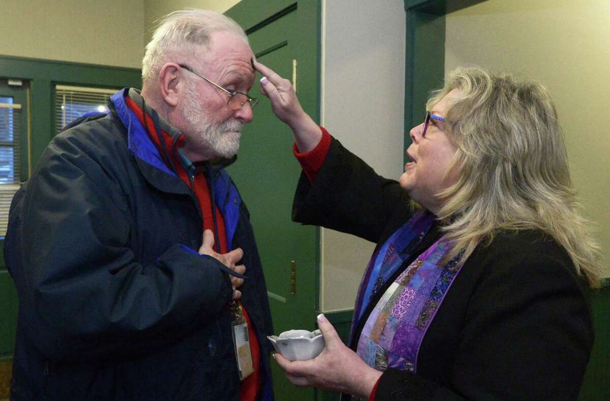 Local ministers bring ashes to the masses