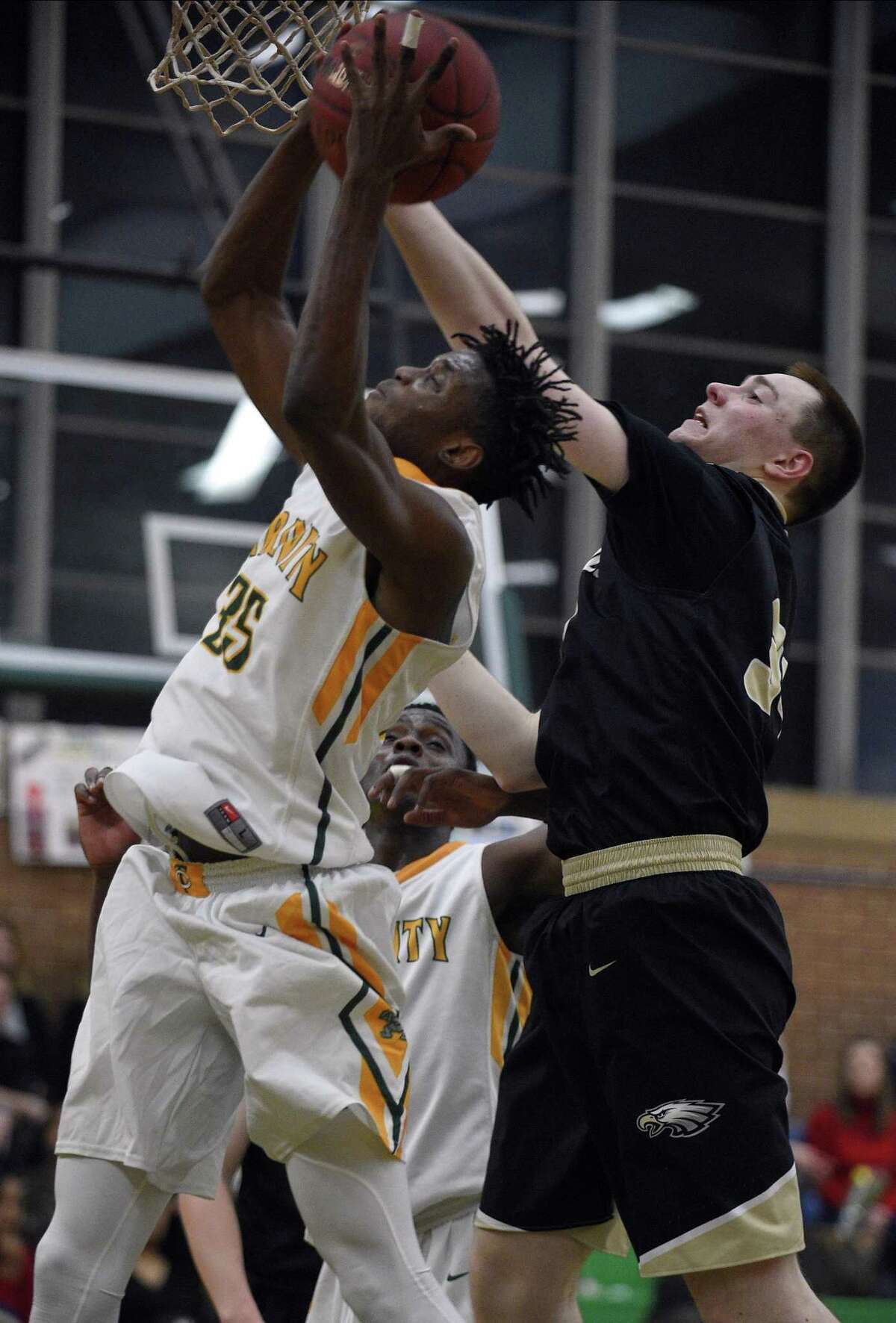 Trinity boys defeat Trumbull