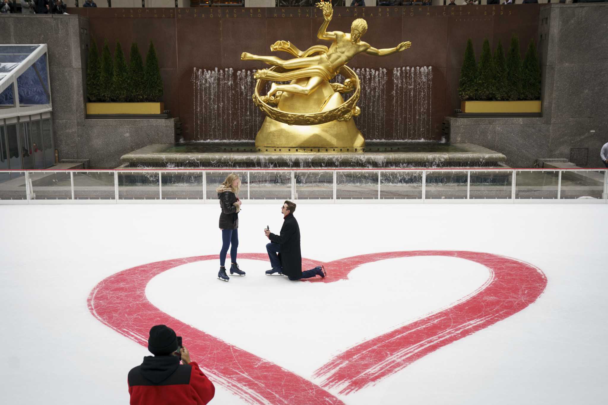 Photos: A ring and a request at Rockefeller rink