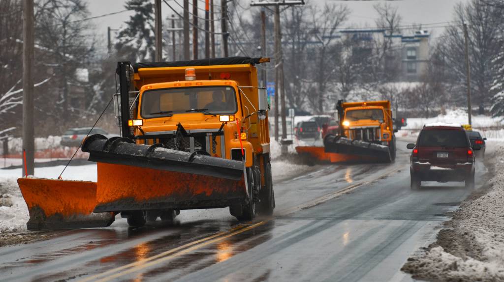 Money woes can't slow plows