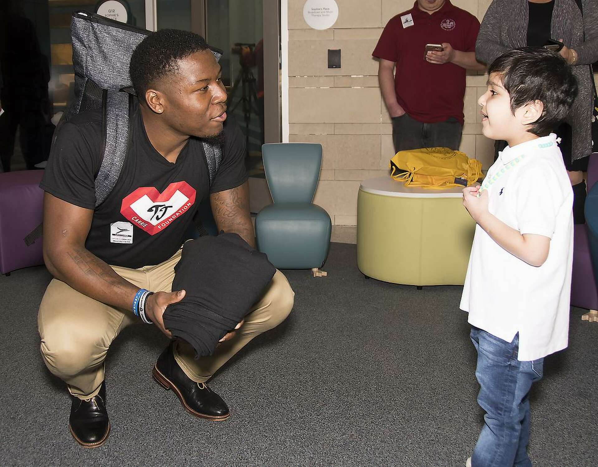 Raiders’ TJ Carrie shares scar, experiences with young patients