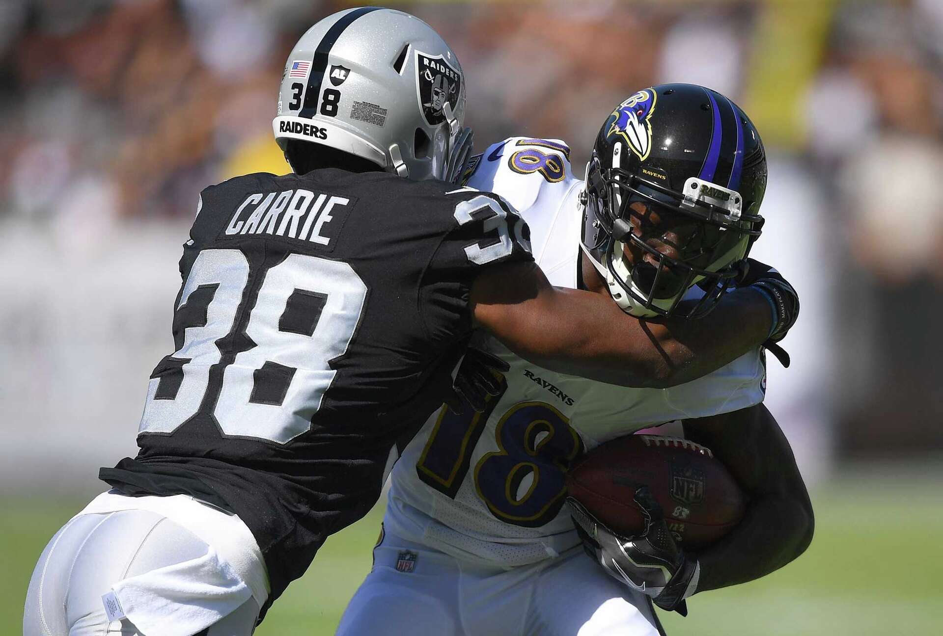 Raiders’ TJ Carrie shares scar, experiences with young patients