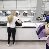 Big changes at SFO's new automated security lanes - SFGate