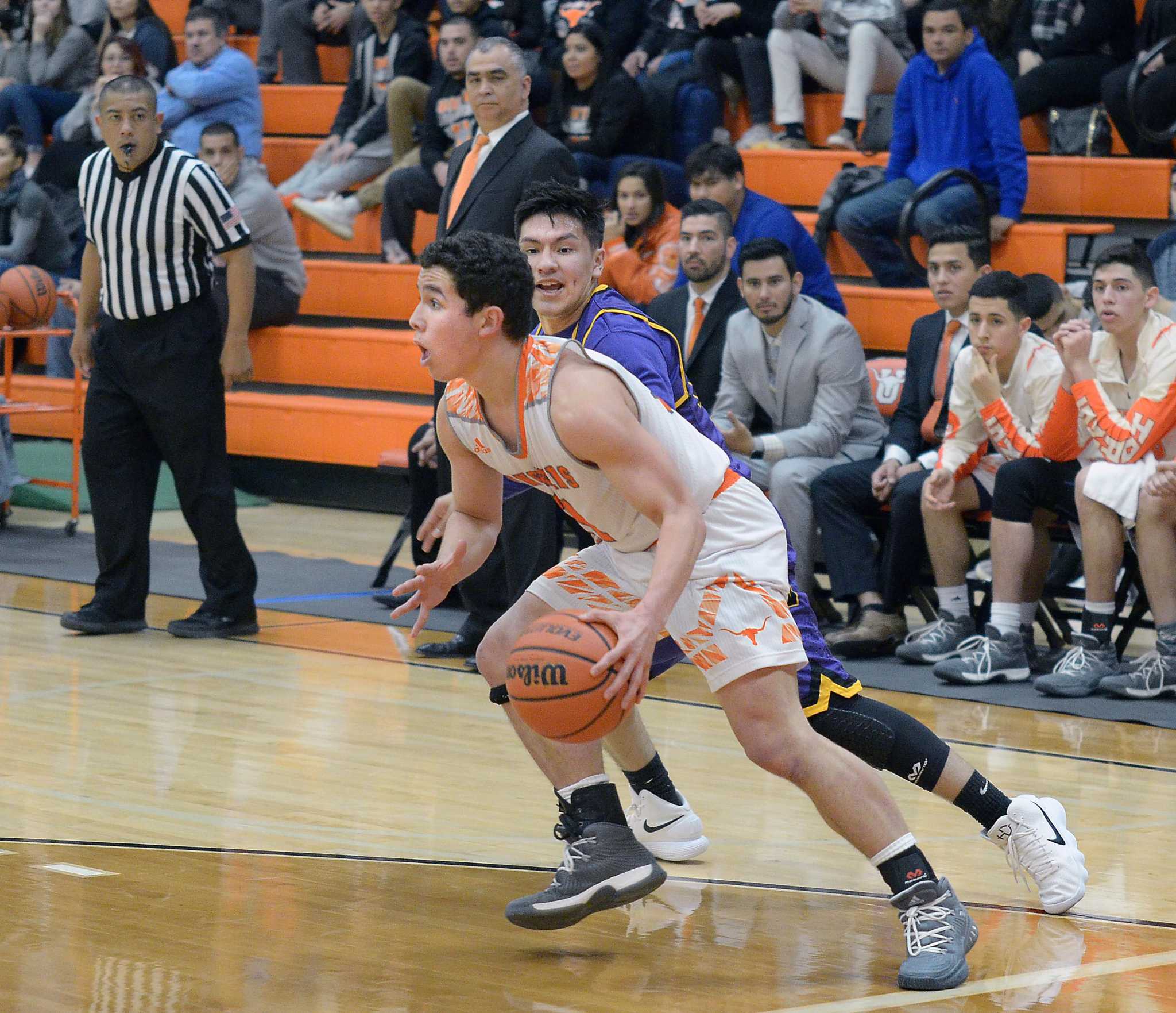 ‘Horns eliminated in opener