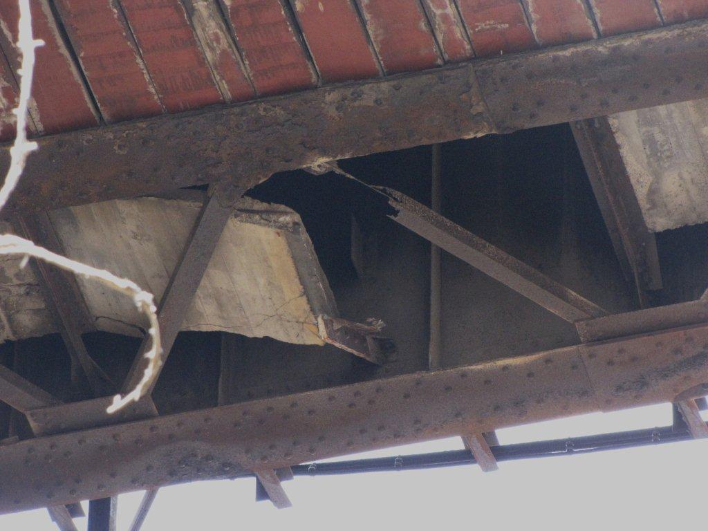 Falling railroad bridge debris causes concern