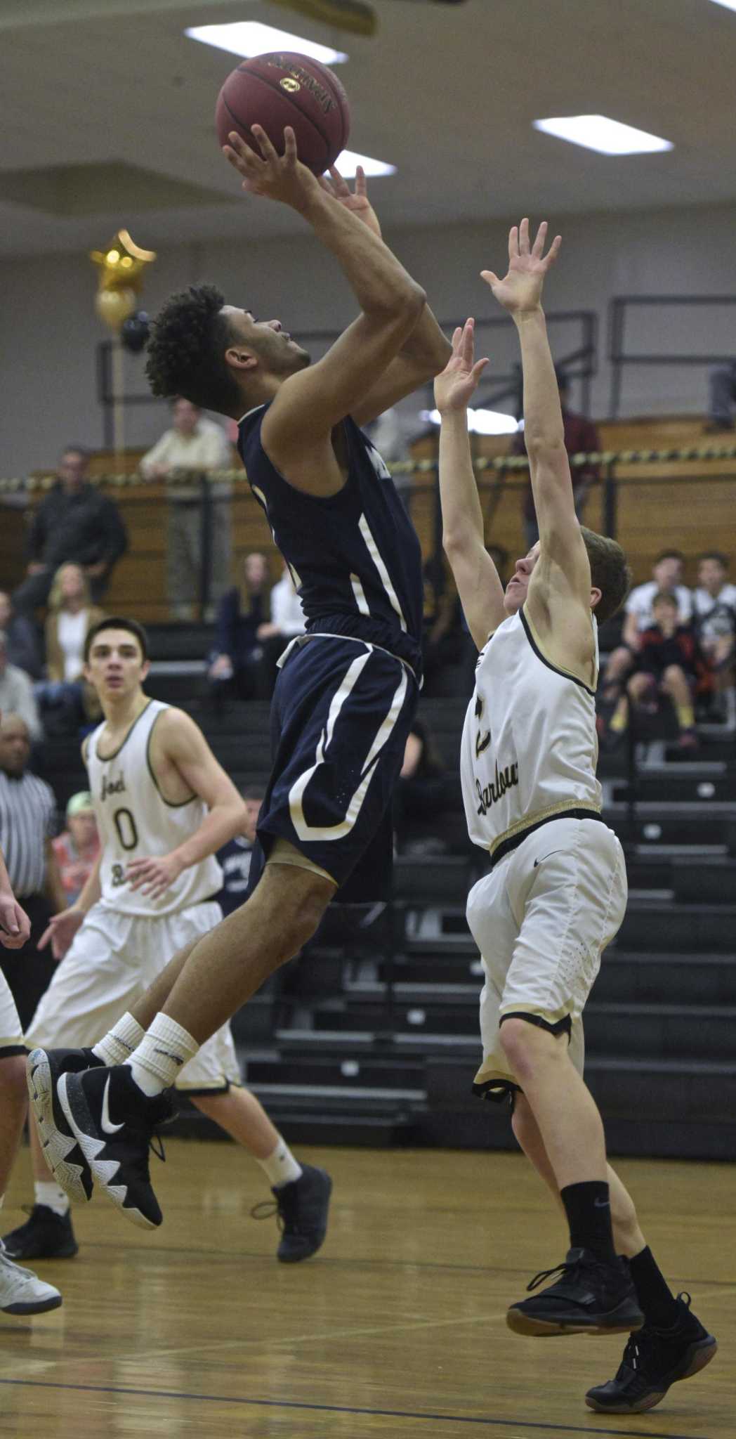 Boys basketball: Doherty nets 1000th point as Immaculate tops Barlow