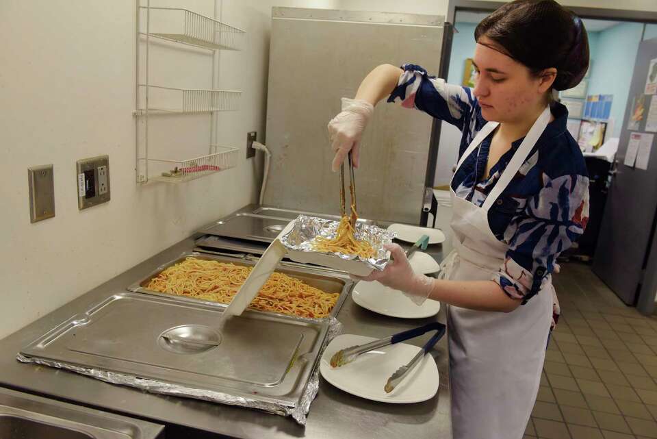 Students in college clubs bond over food and beverages