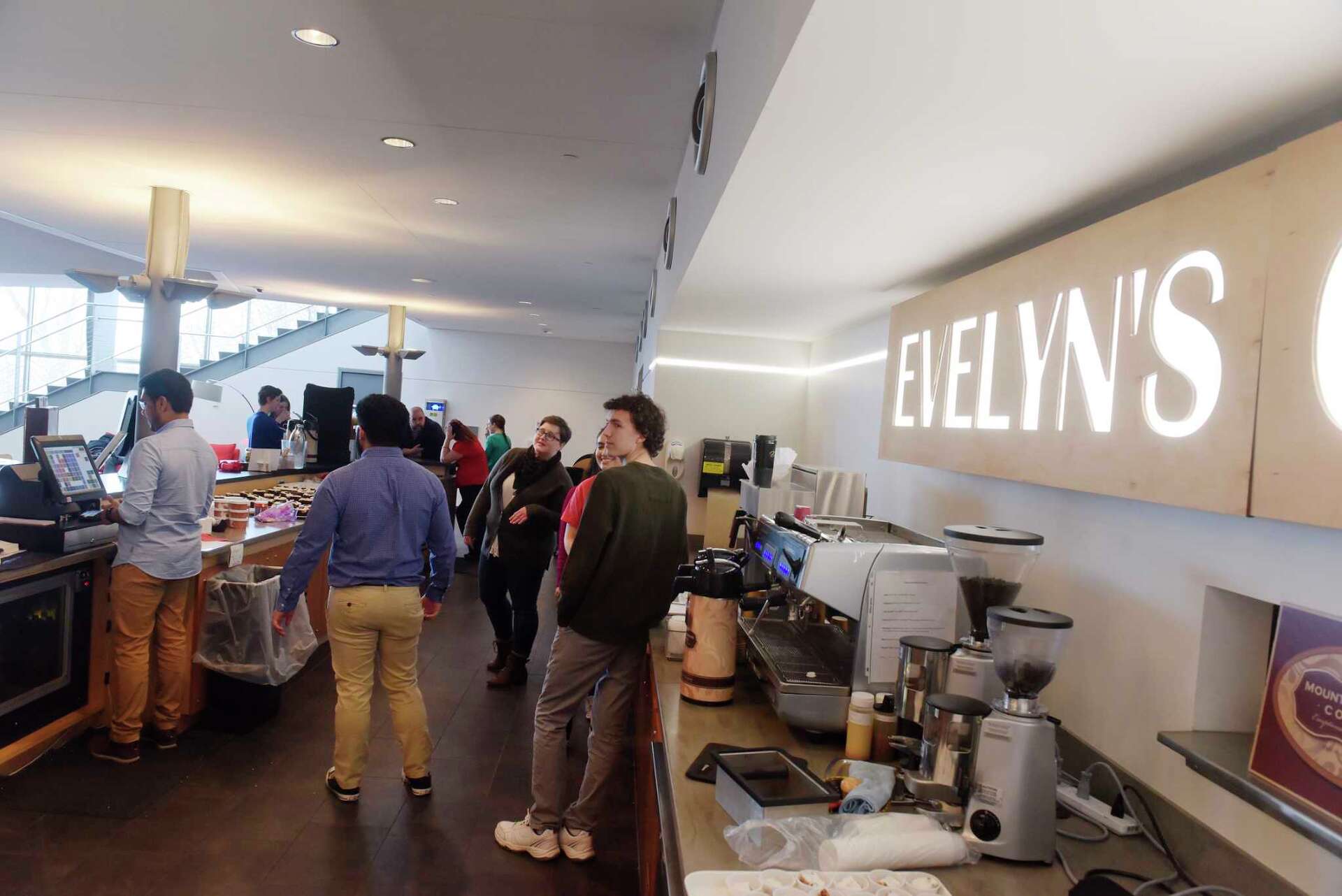 Students in college clubs bond over food and beverages