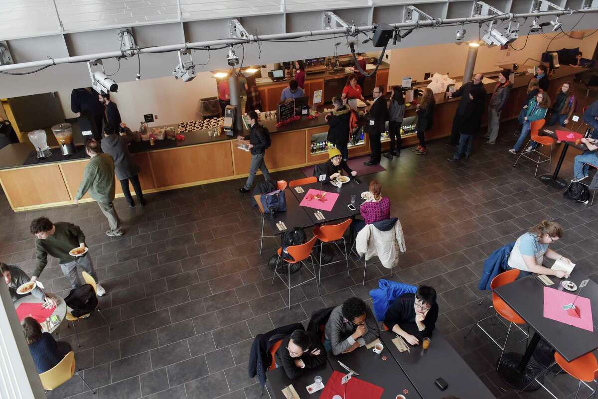 Students in college clubs bond over food and beverages