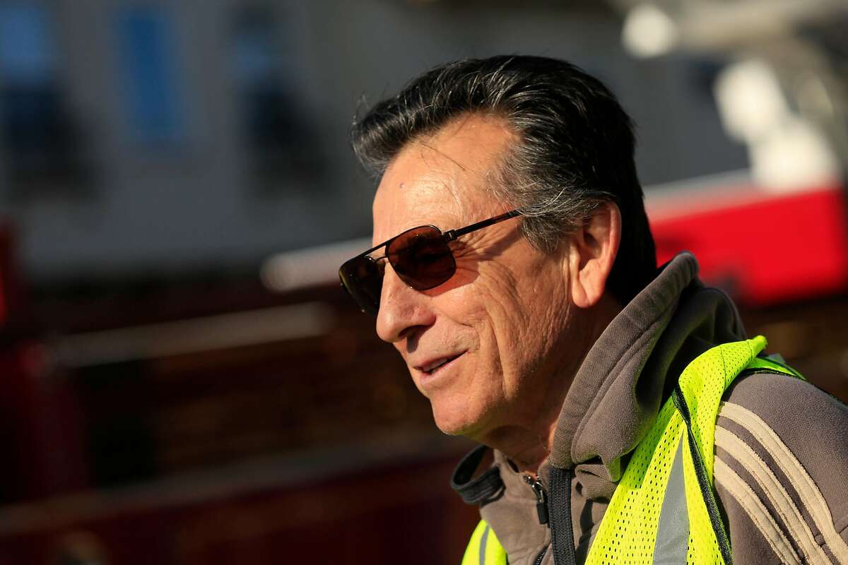 Historic Oakland building with history of problems destroyed by fire