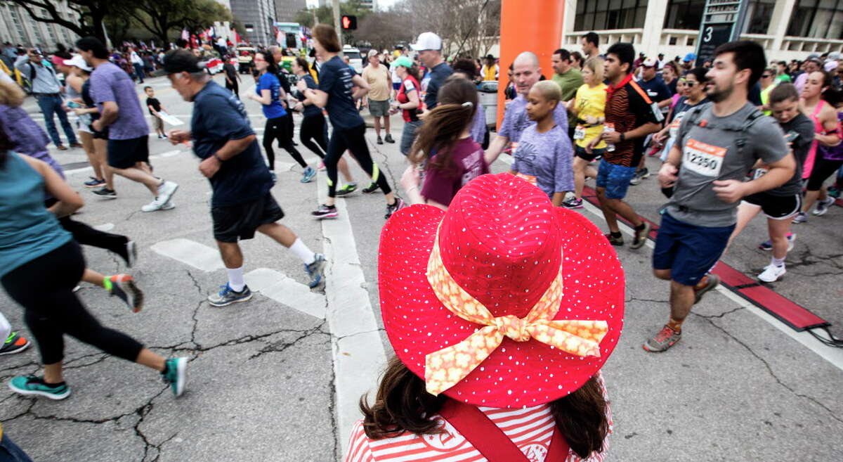 Houston Livestock Show and Rodeo parade gallops through downtown