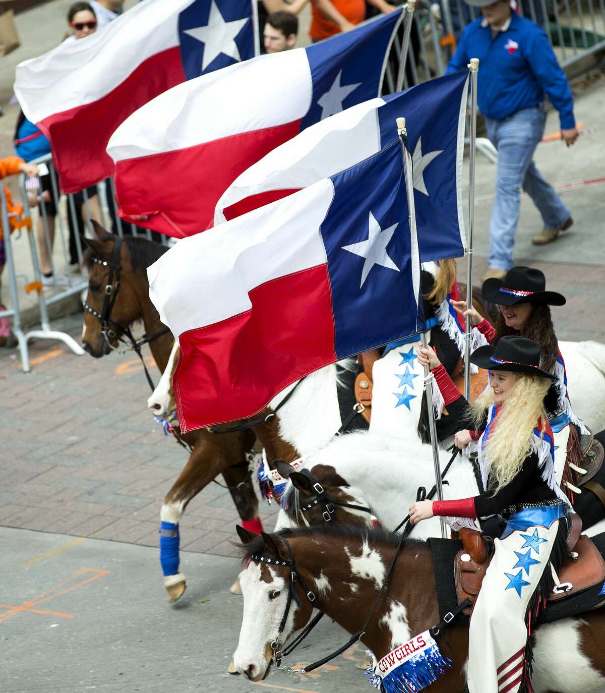 Houston Livestock Show and Rodeo parade gallops through downtown