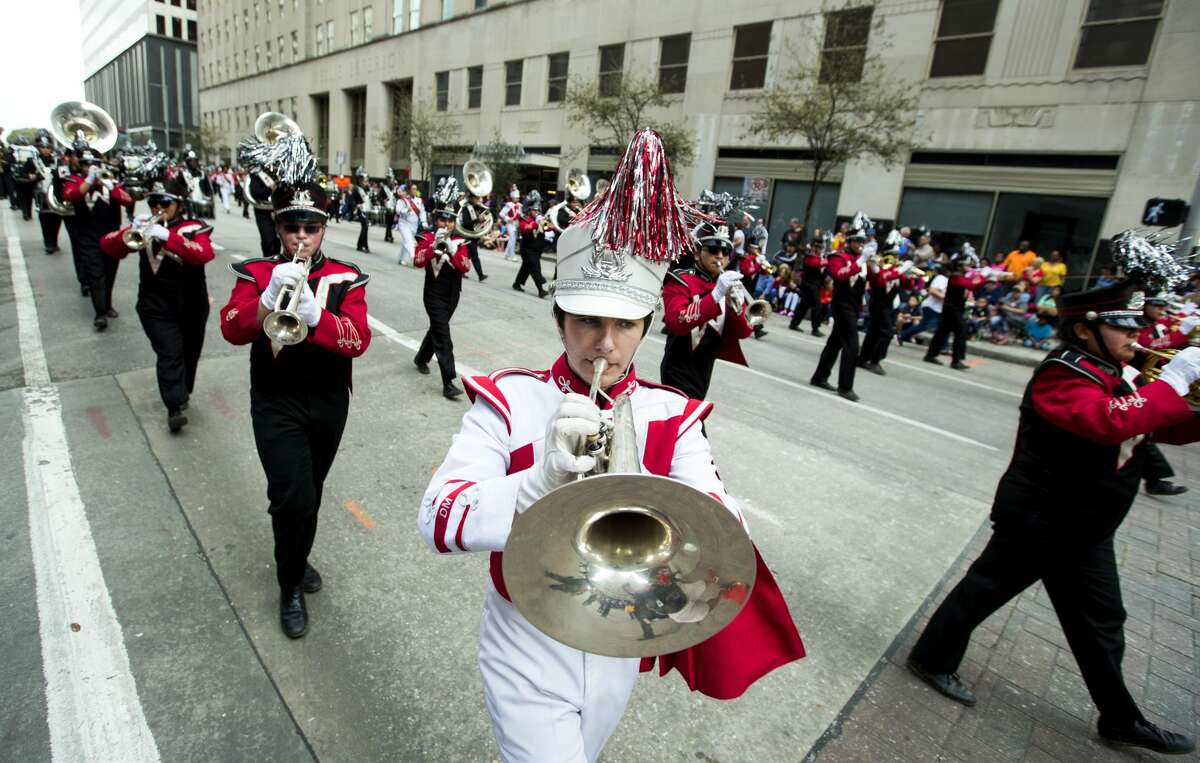 Houston Livestock Show and Rodeo parade gallops through downtown