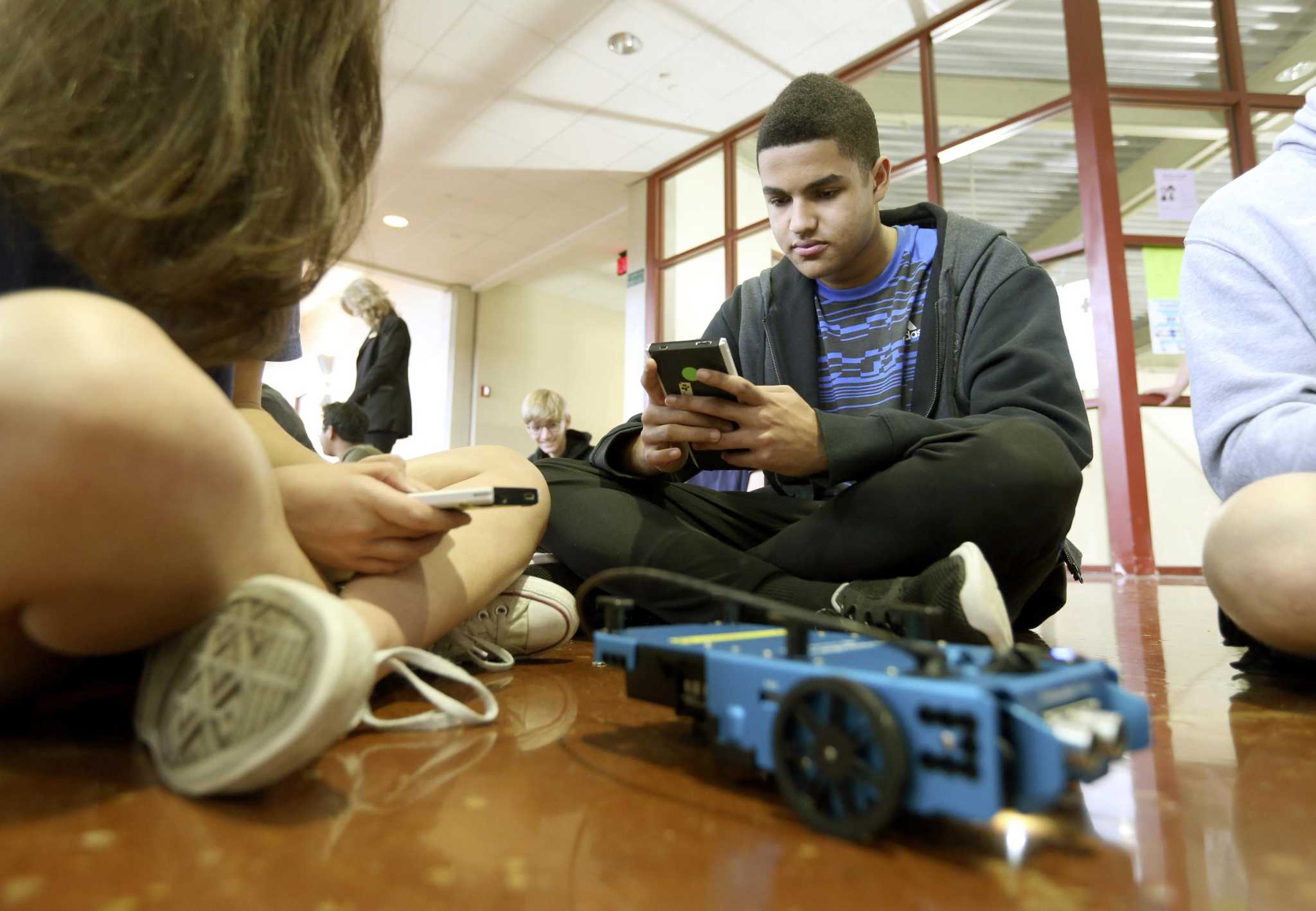 Students learn to code robots with calculators