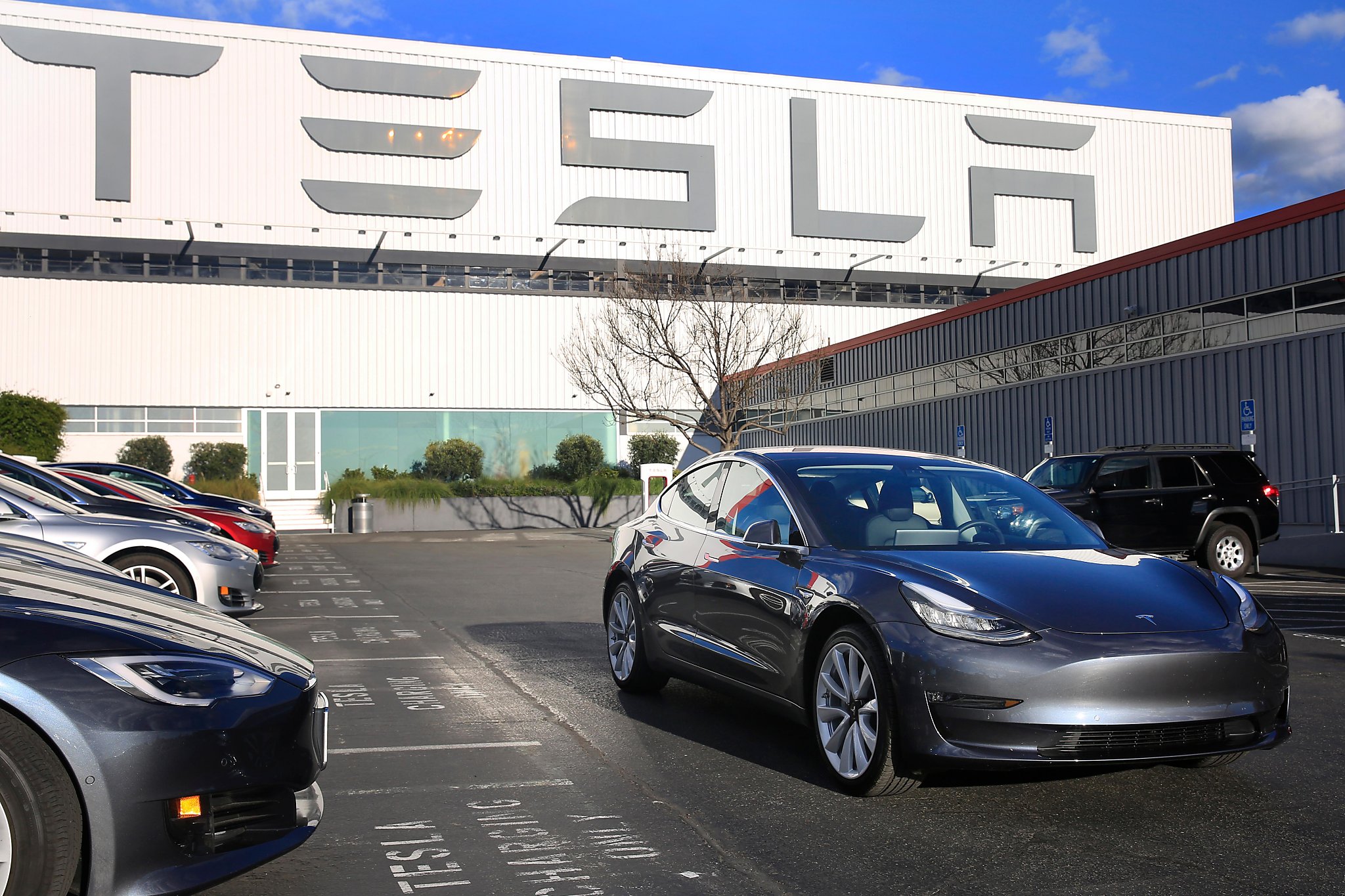 Tesla Racial Bias Suit Tests the Rights of Contract Workers