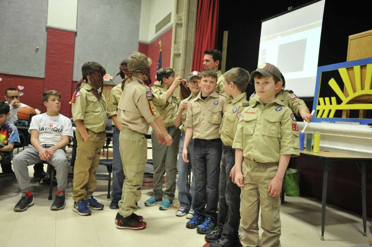 Winsted Cub Scouts graduate to become Boy Scouts as parents look on ...