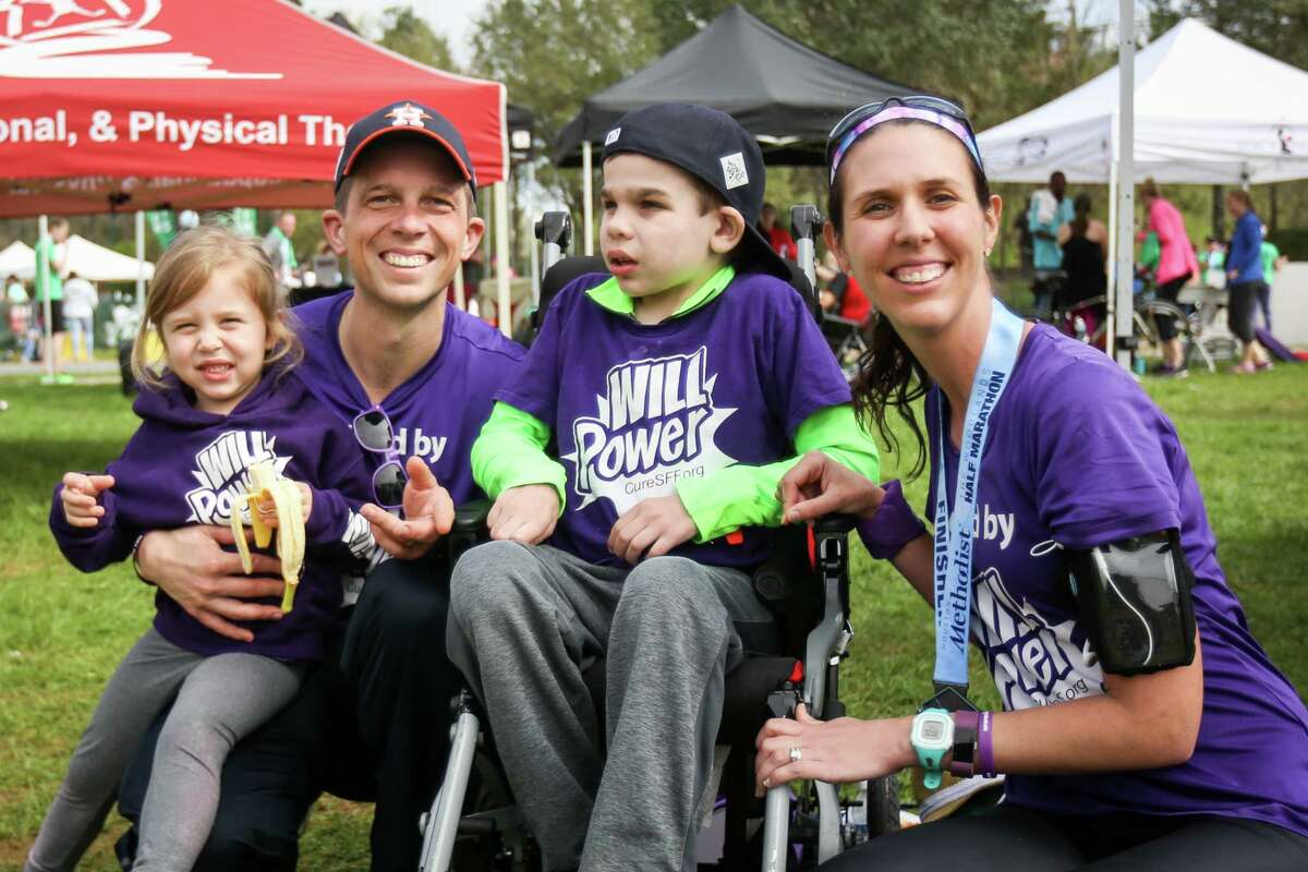 Thousands stride across the finish line of The Woodlands Marathon