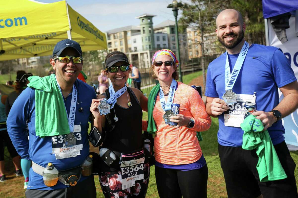 Thousands stride across the finish line of The Woodlands Marathon