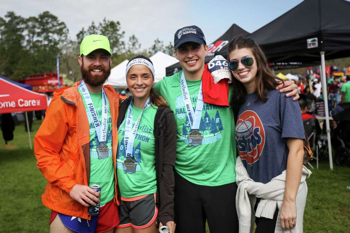 Thousands stride across the finish line of The Woodlands Marathon