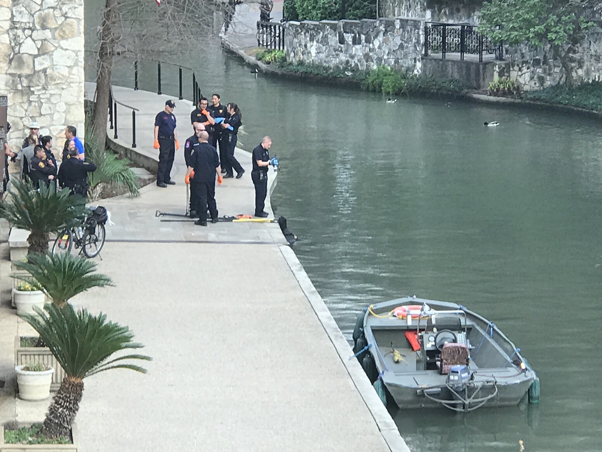 A dead person was found floating along the River Walk Sunday afternoon