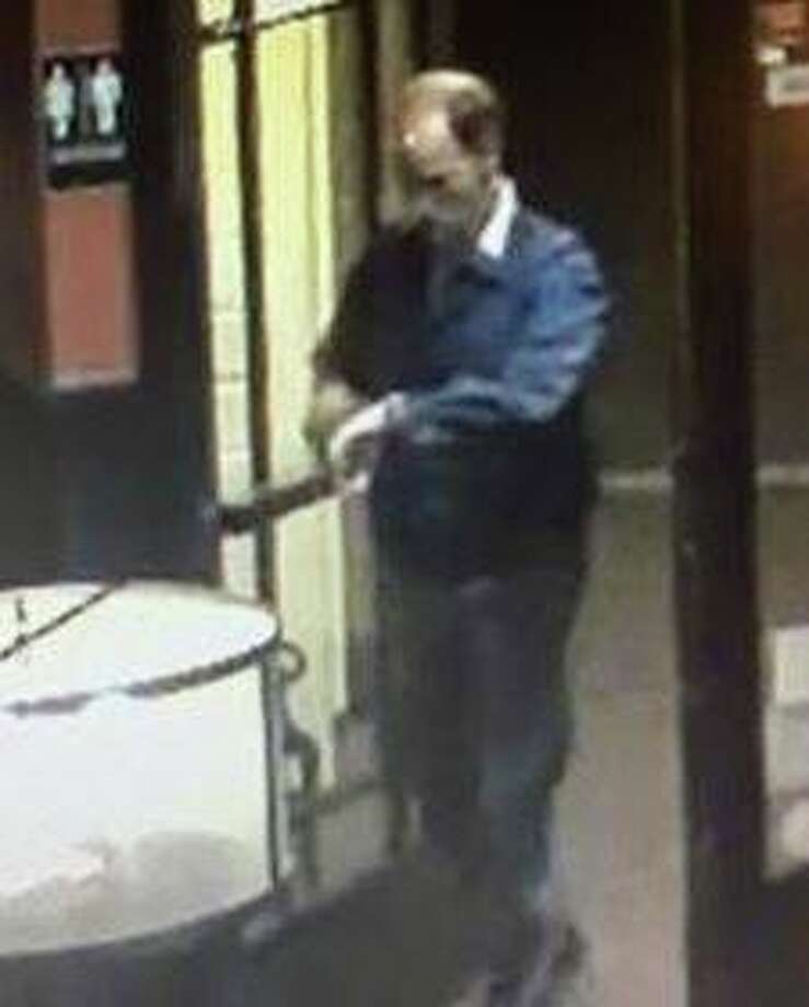 Police seeking to ID man seen peeking over restroom stall - SFGate