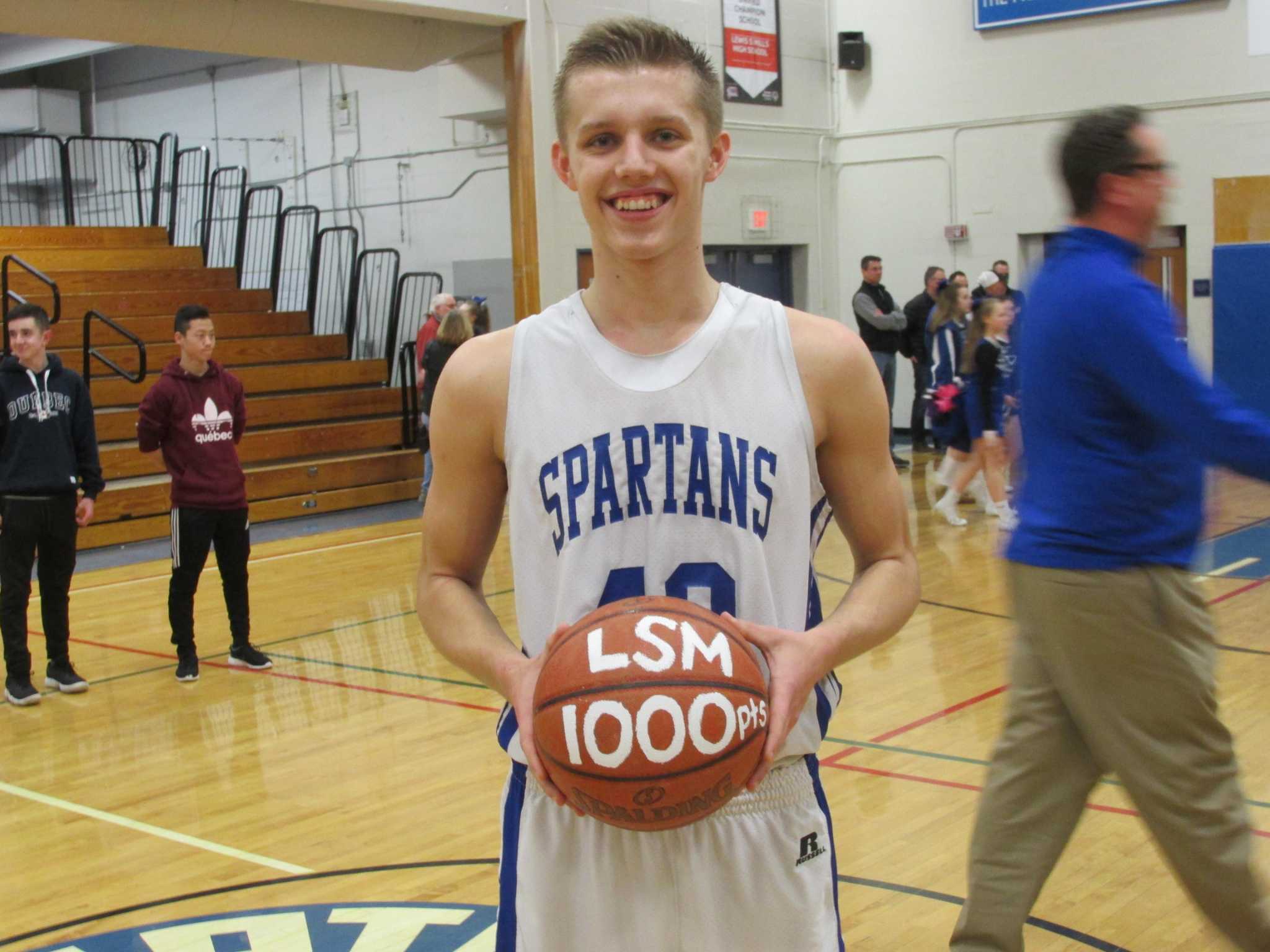 Boys basketball: Josh Schibi hits milestone as Lewis Mills tops Law