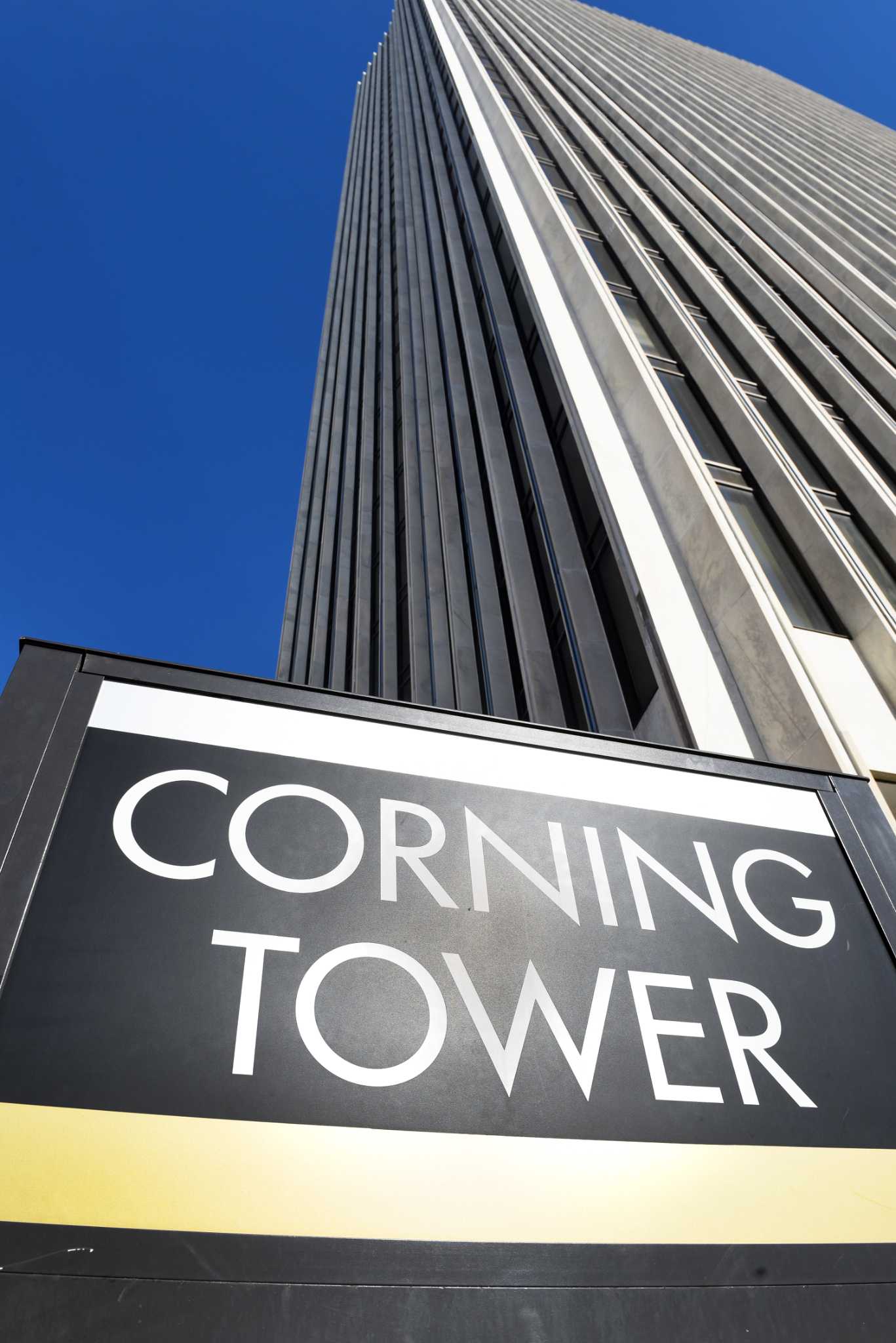Copters haul equipment atop Corning Tower