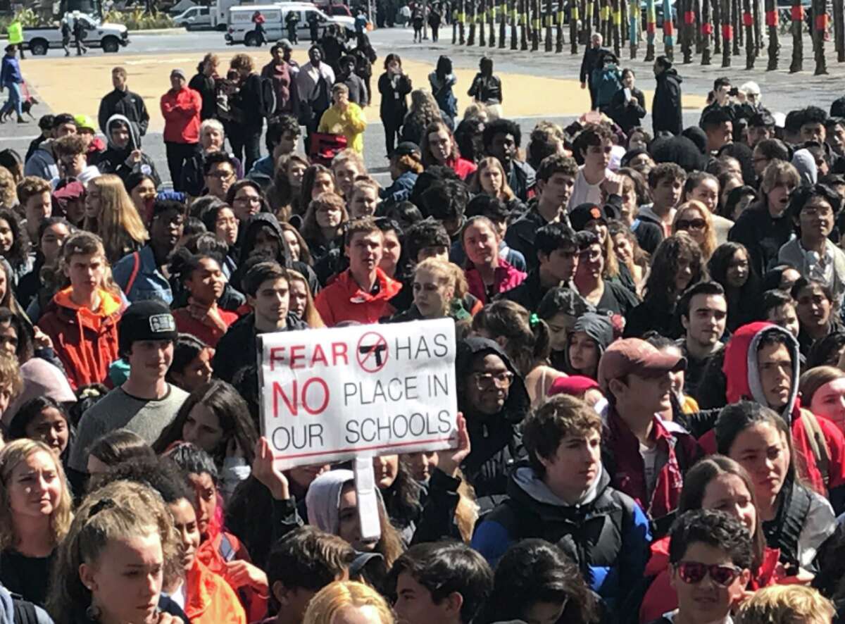 Best signs from the national campus walkout to protest gun violence