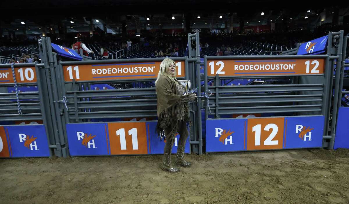 At the 50-yard line, Rodeo Houston’s timers clock winners and losers
