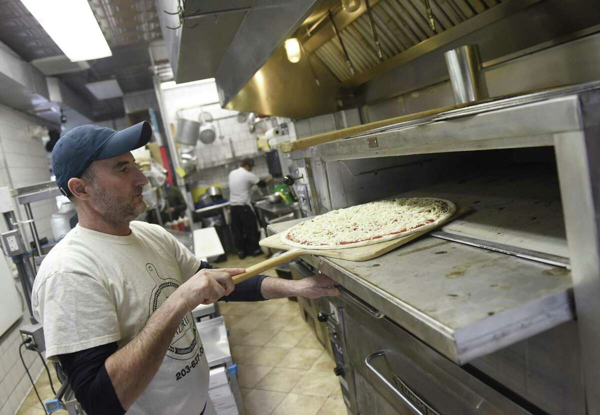 Greenwich Pizzeria gets new owners, menu