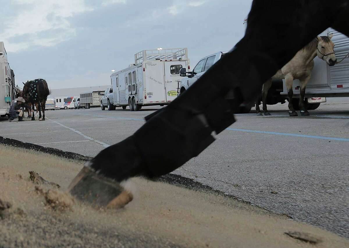 Rodeo photos: Rides, games, prizes and lights of the midway