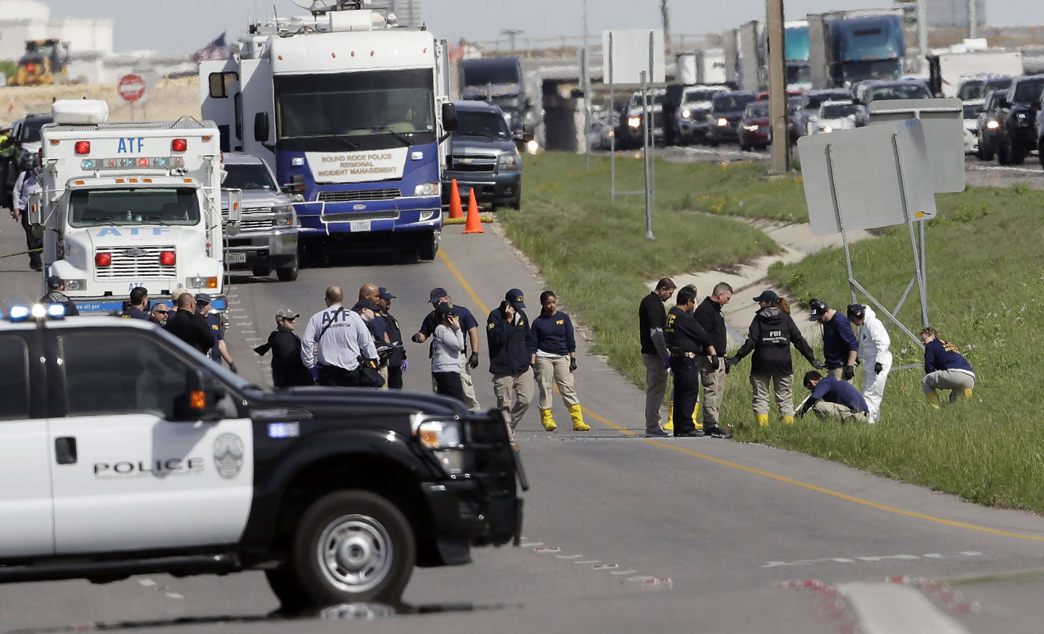 In Austin bombings, investigators sift through clues, looking for a motive