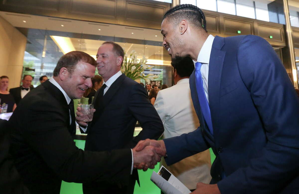 Pitbull performance rocks Houston Children's Charity into record $2.2 ...