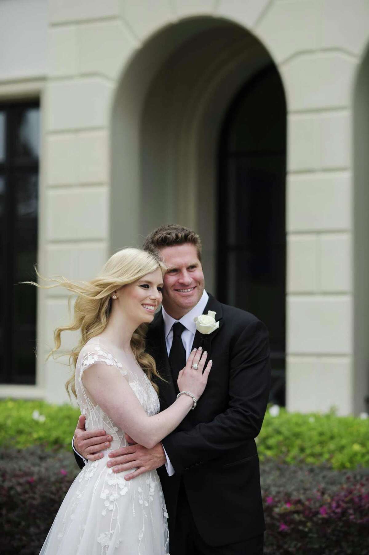 Bound by a love of tennis and rescue animals, young couple ties the ...