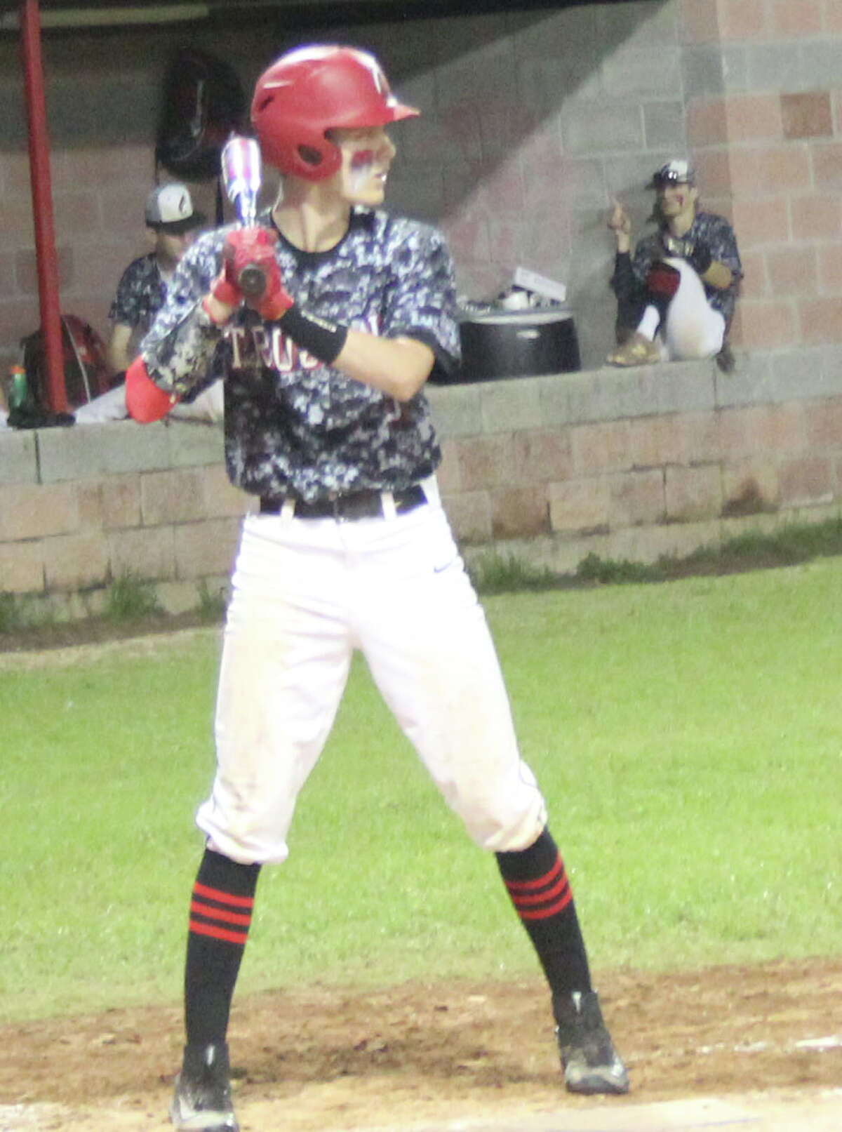 Trojans overwhelm Onalaska Wildcats 12-3