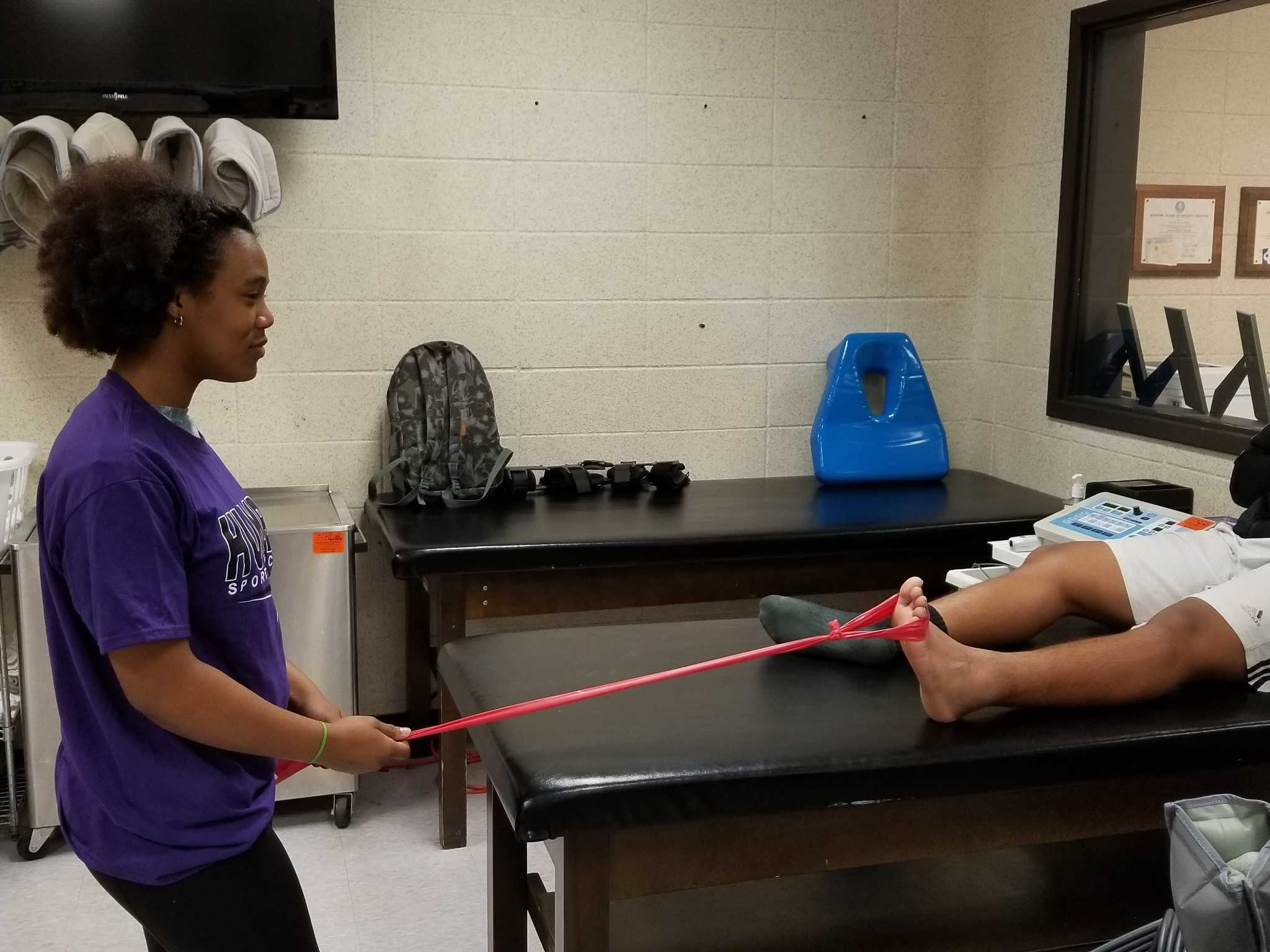 Student trainers serve as more than just a water boy/girl